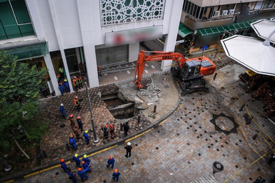 CCTV Footage Shows Exact Moment Woman Falls into Sinkhole at Masjid ...