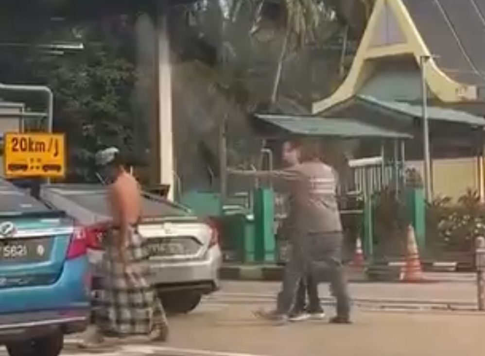 Two Men Seen Squaring Off at Toll Booth, One Now Wanted by Police ...