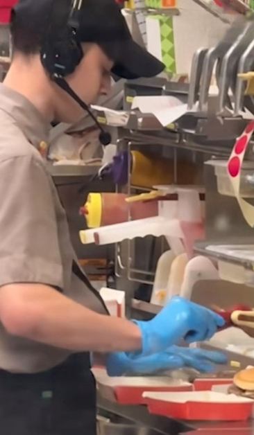 Caught on Camera: Restaurant Worker Spits in Burger, Allegedly Over ...
