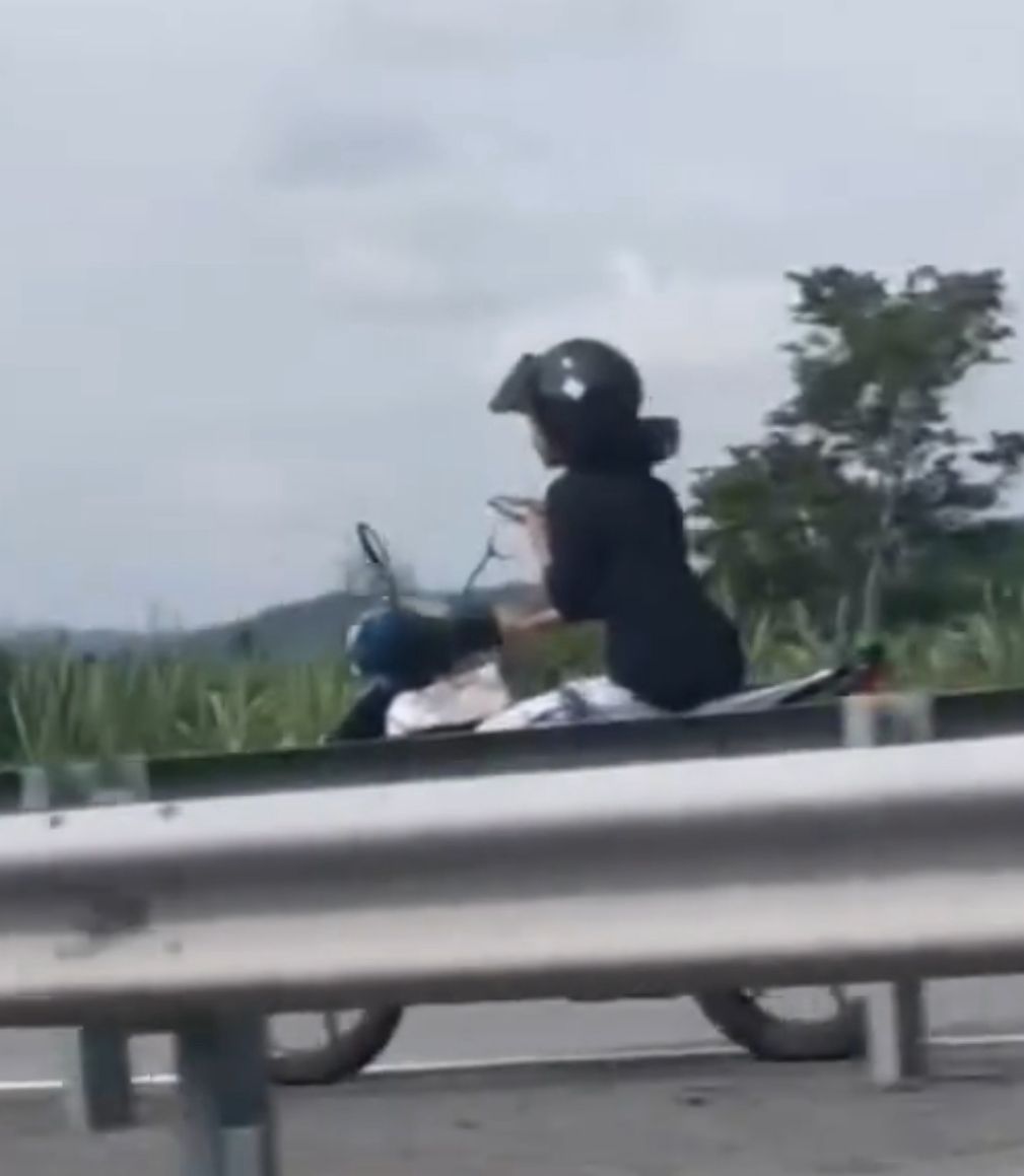 Woman Seen Riding Motorcycle Against Traffic on the North-South ...