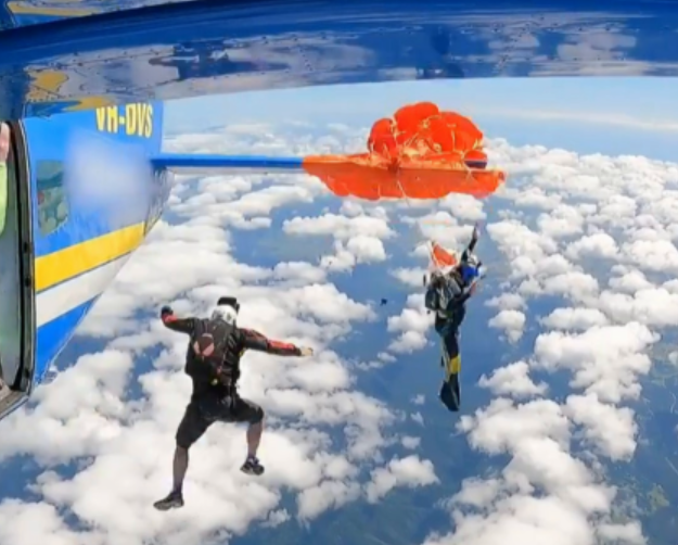 Skydiver Survives After Parachute Gets Tangled on Plane Tail Mid-Air ...