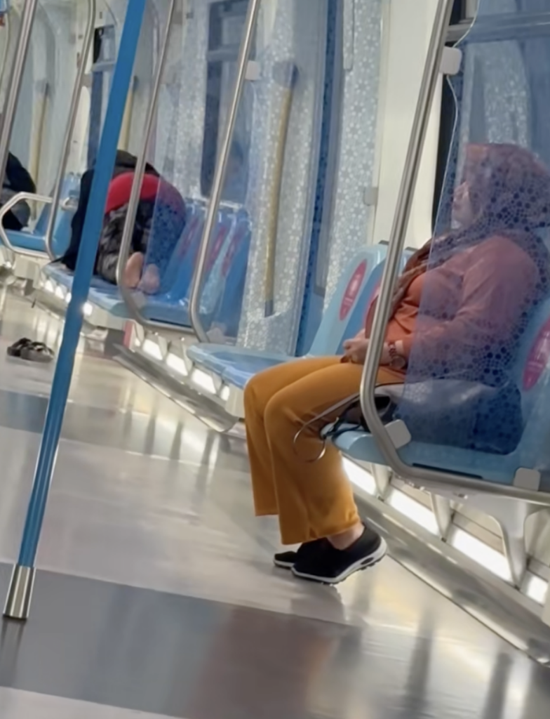 Woman Does Barefoot Exercises on MRT Seat During Morning Commute - Wake ...